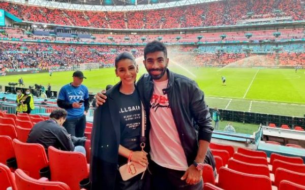 Jasprit Bumrah and Sanjana Ganesan pose together from the semifinals night of EURO 2020